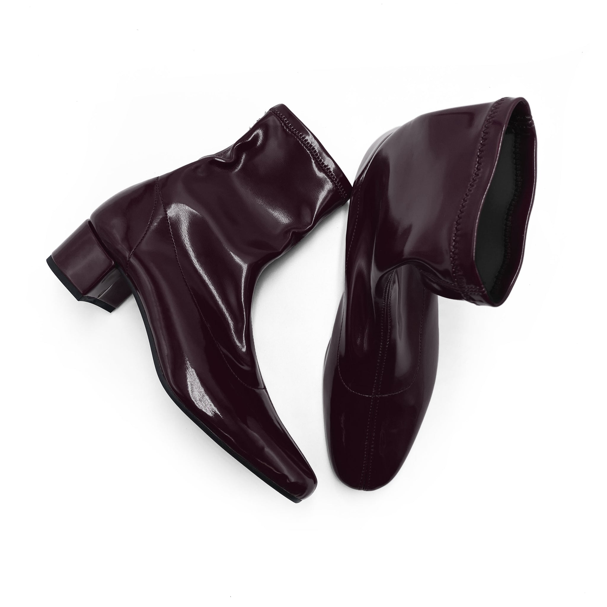 Eggplant patent ankle boots with stretch sock fit